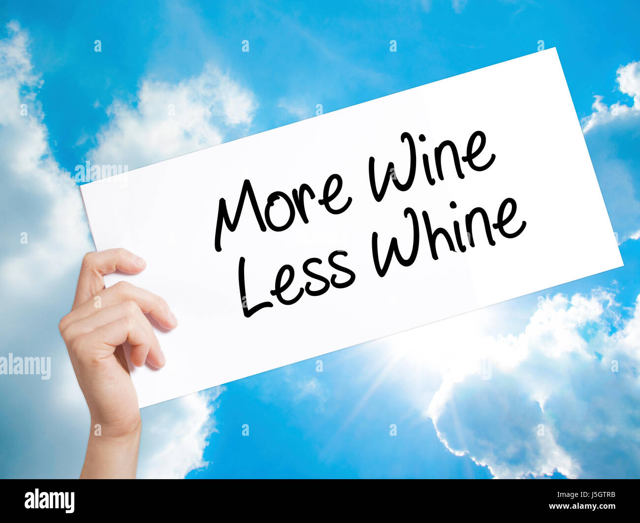 More Wine Less Whine Sign on white paper. Man Hand Holding Paper with ...