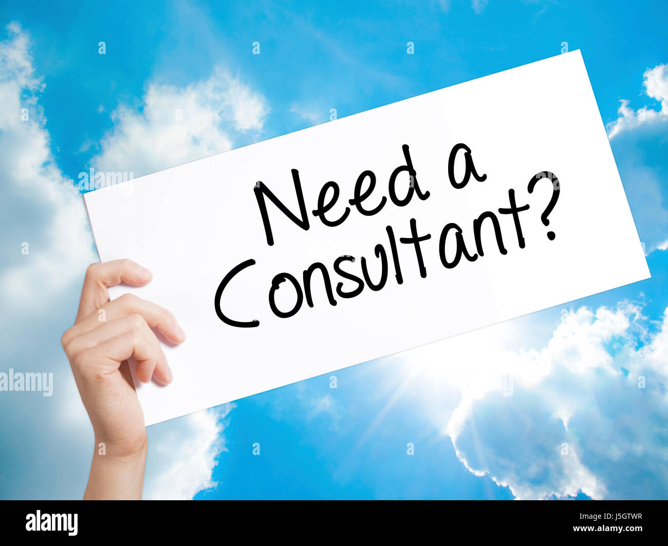 Need a Consultant? Sign on white paper. Man Hand Holding Paper with ...