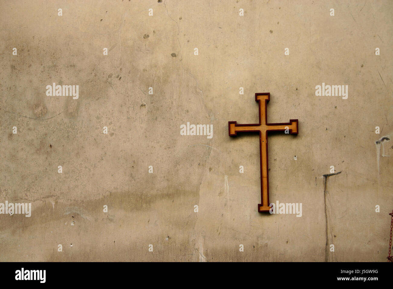 cross on a church wall Stock Photo - Alamy