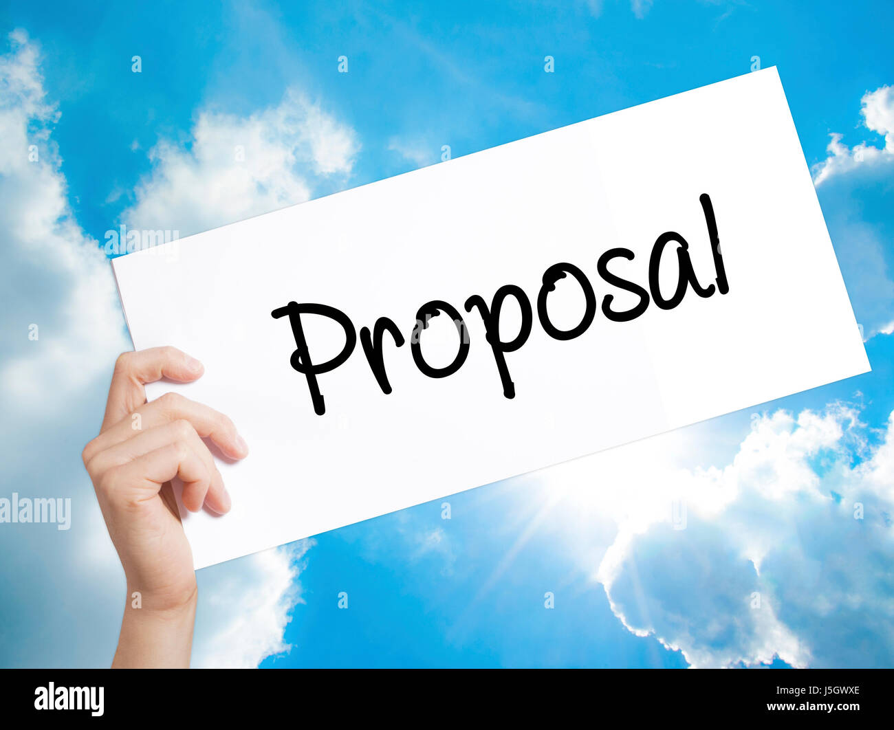 Proposal Sign on white paper. Man Hand Holding Paper with text ...