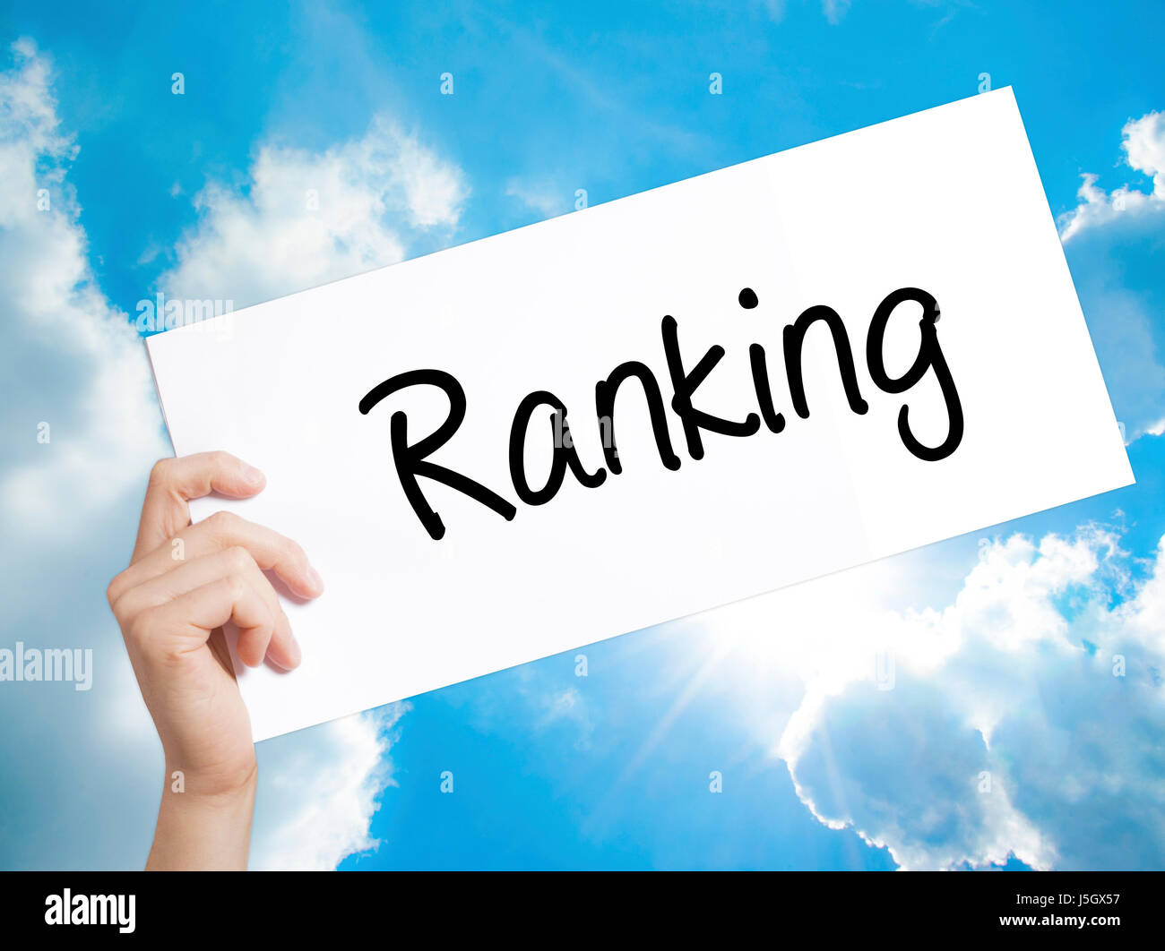 Ranking Sign on white paper. Man Hand Holding Paper with text. Isolated ...