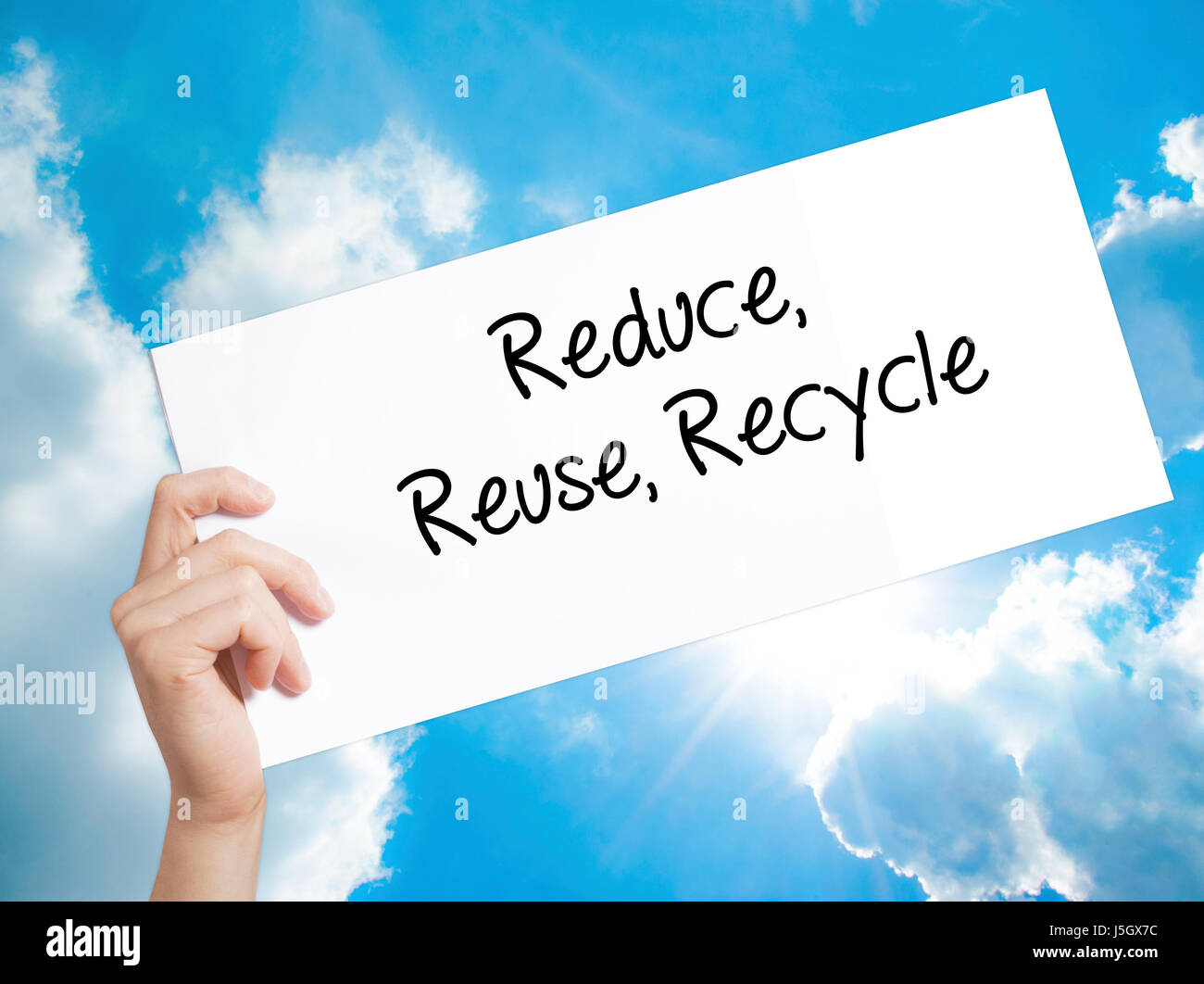Reduce Reuse Recycle Sign on white paper. Man Hand Holding Paper with ...
