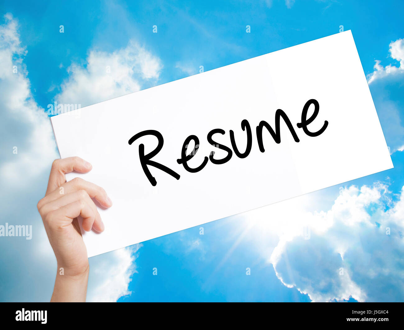 Resume Sign on white paper. Man Hand Holding Paper with text. Isolated ...