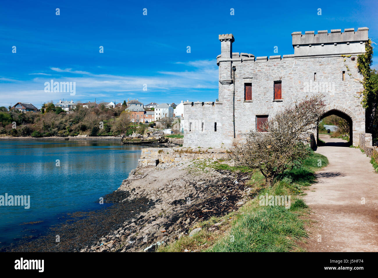 The 19th-century folly known as Radford Castle located on a dam ...
