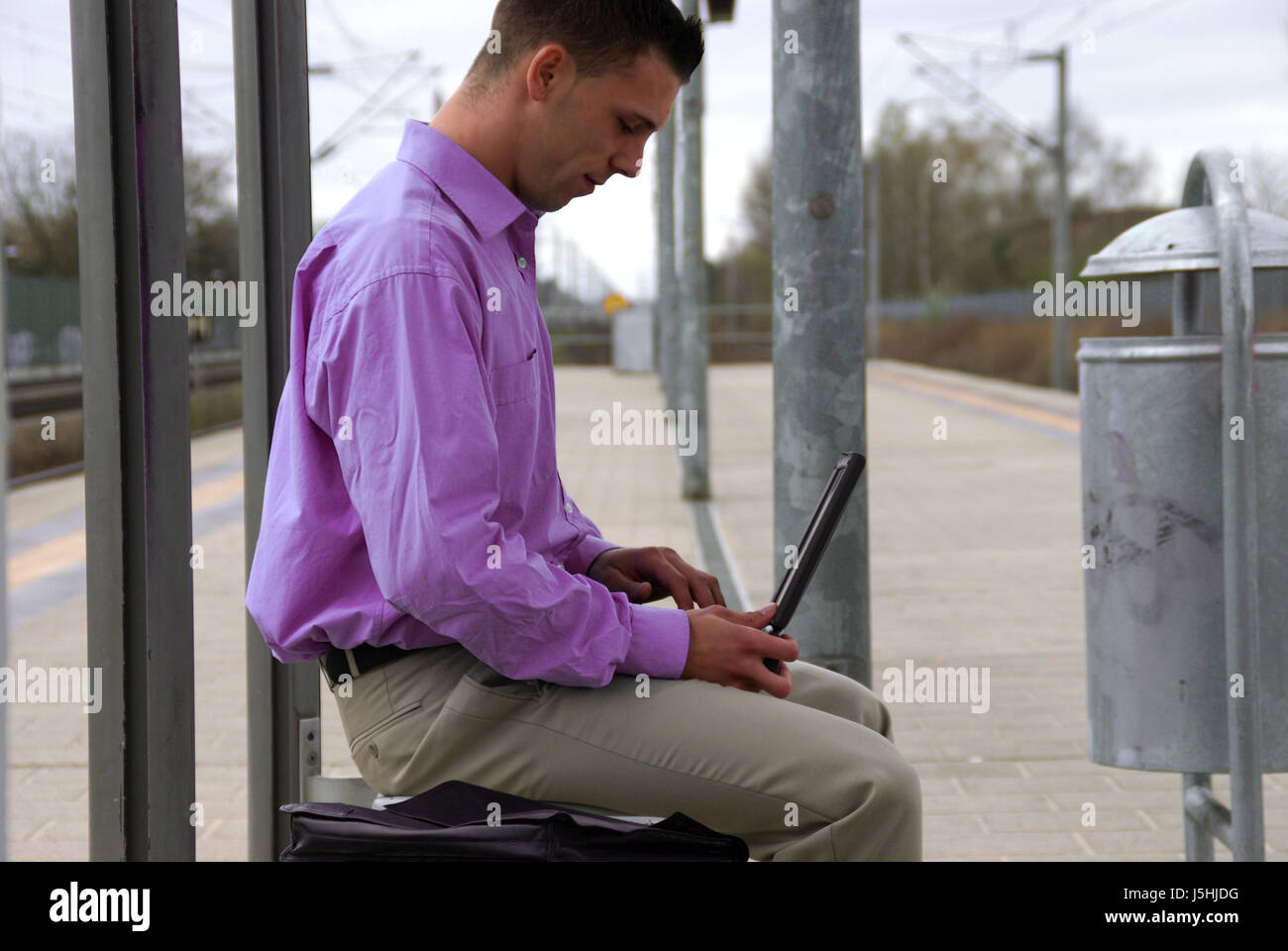 wait waiting station laptop notebook computers computer tracks jeans ...
