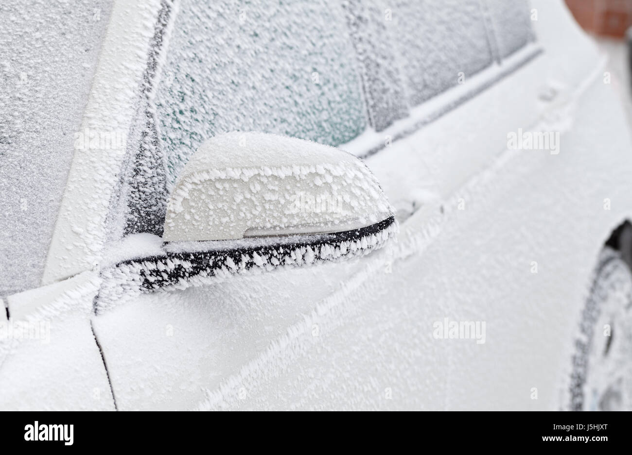 Picture of an iced car mirror and window Stock Photo - Alamy