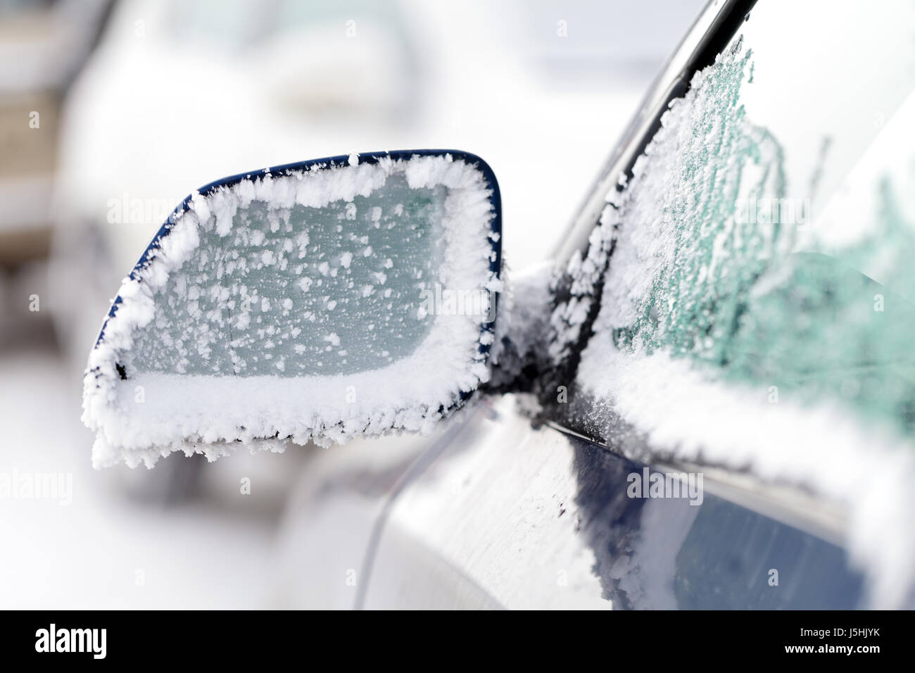 Picture of an iced car mirror and window Stock Photo - Alamy