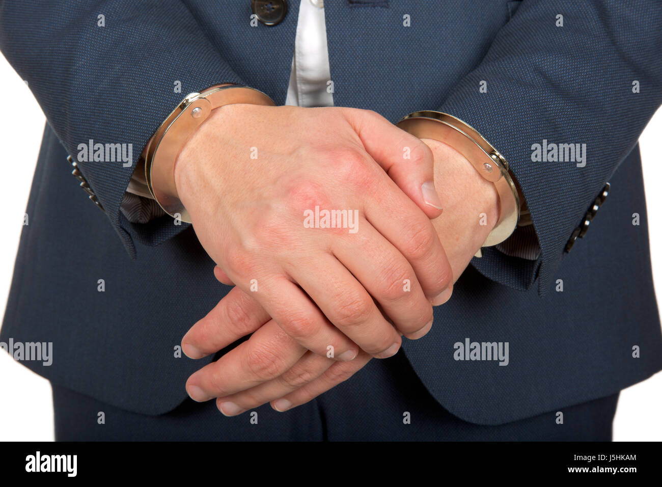 Man handcuffed suit hi-res stock photography and images - Alamy
