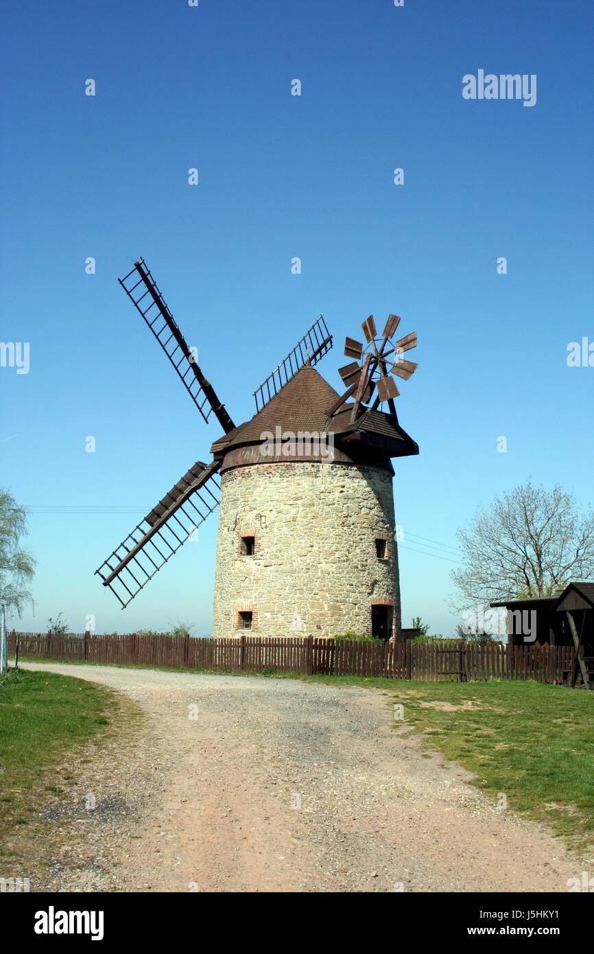 blue story monument engineering dirt road nostalgia windmill mill grind ...
