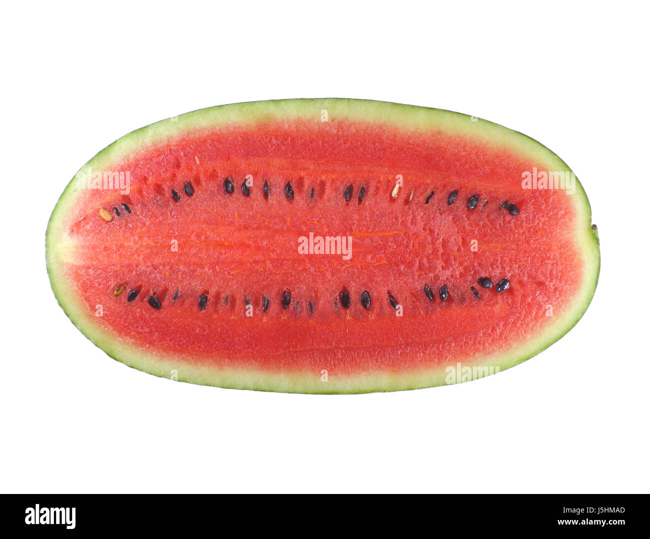 Oval shaped ripe red watermelon with seed cut in half showing seeds ...