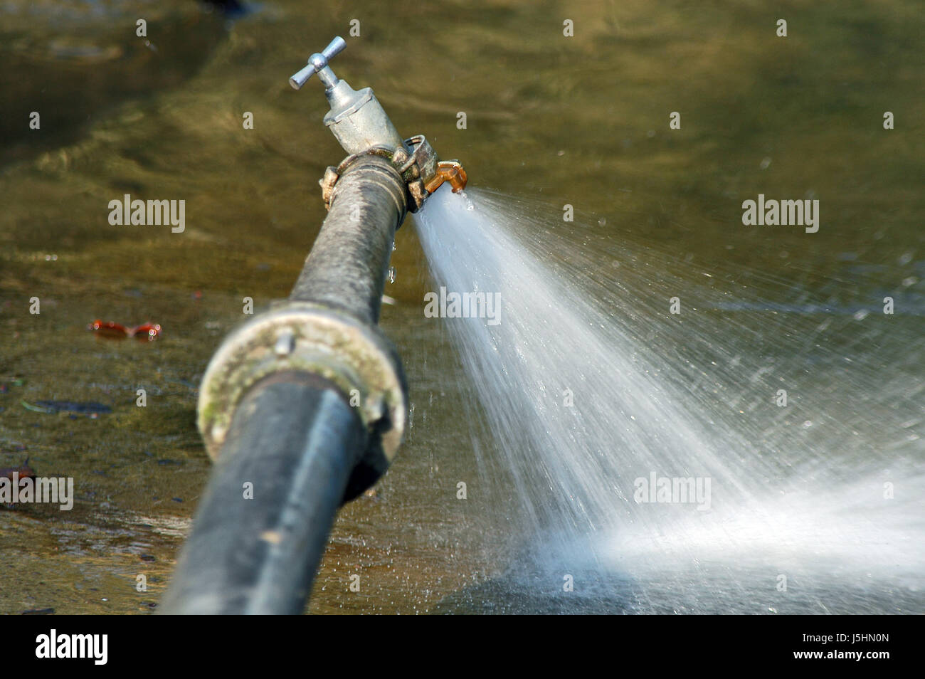 green brown brownish brunette steel wet cool squirt tap fresh water ...