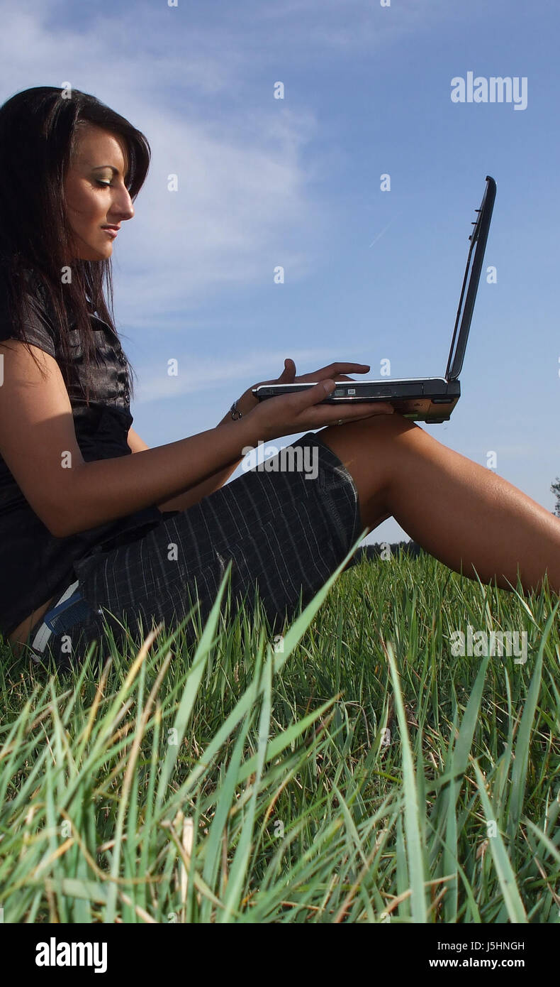 woman profile legs laptop notebook computers computer PC paper academic ...