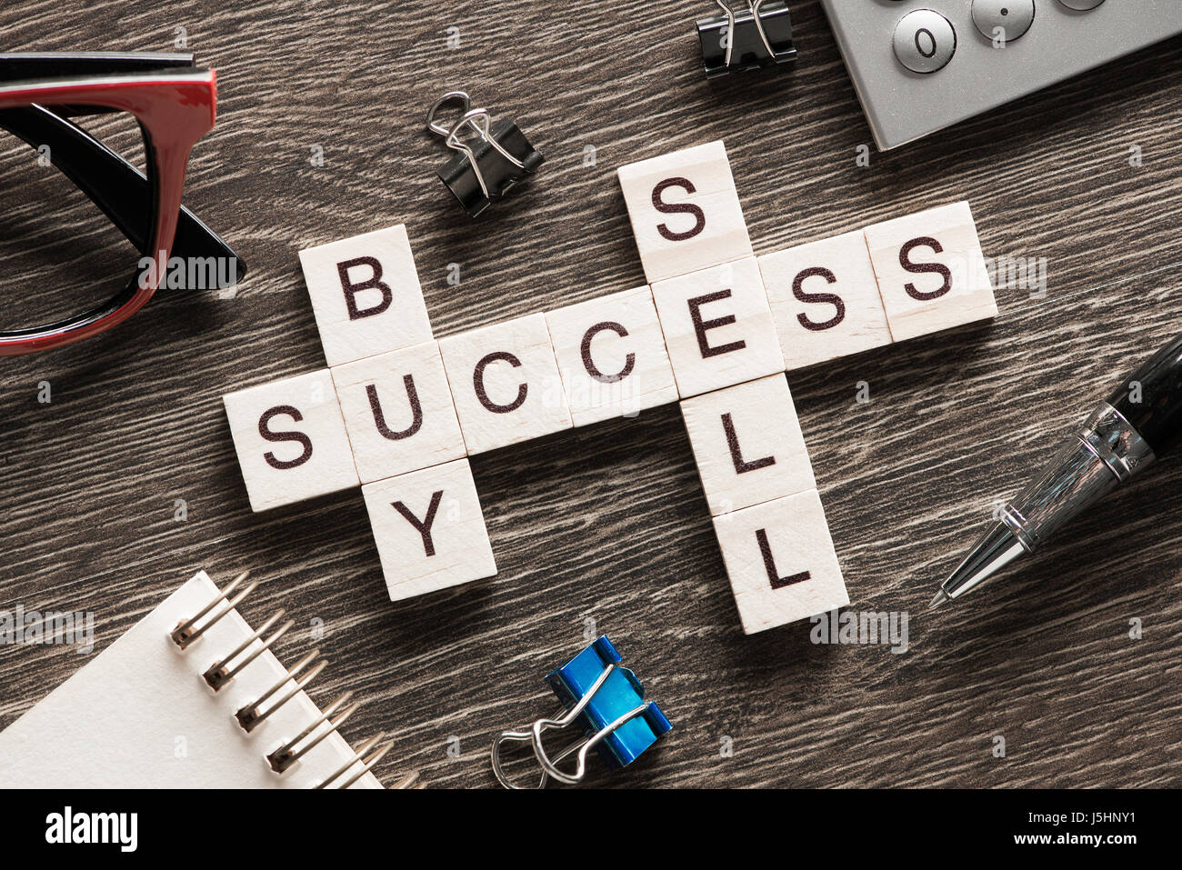 Conceptual business keywords on table with elements of game making ...