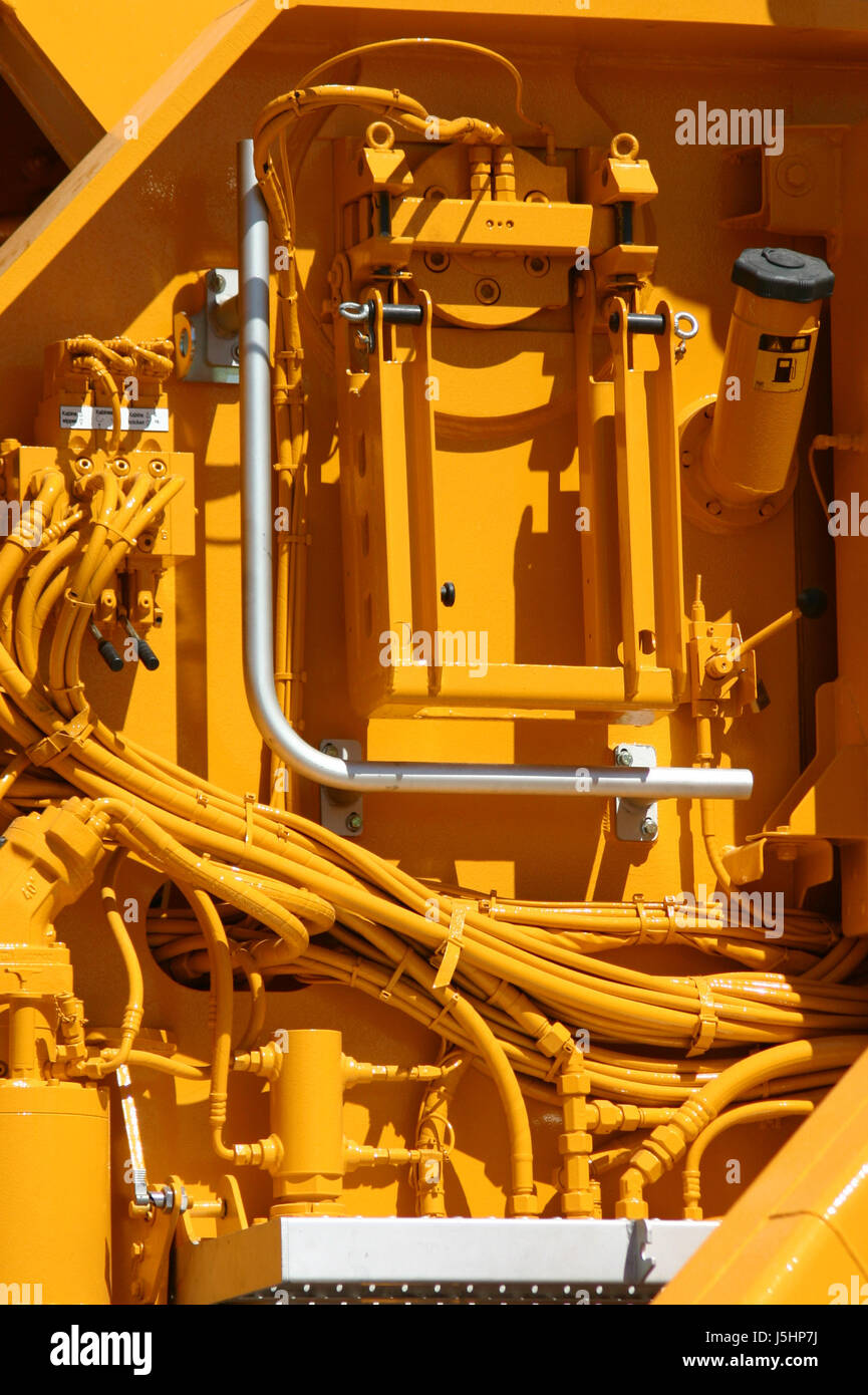 hydraulic equipment in yellow Stock Photo - Alamy