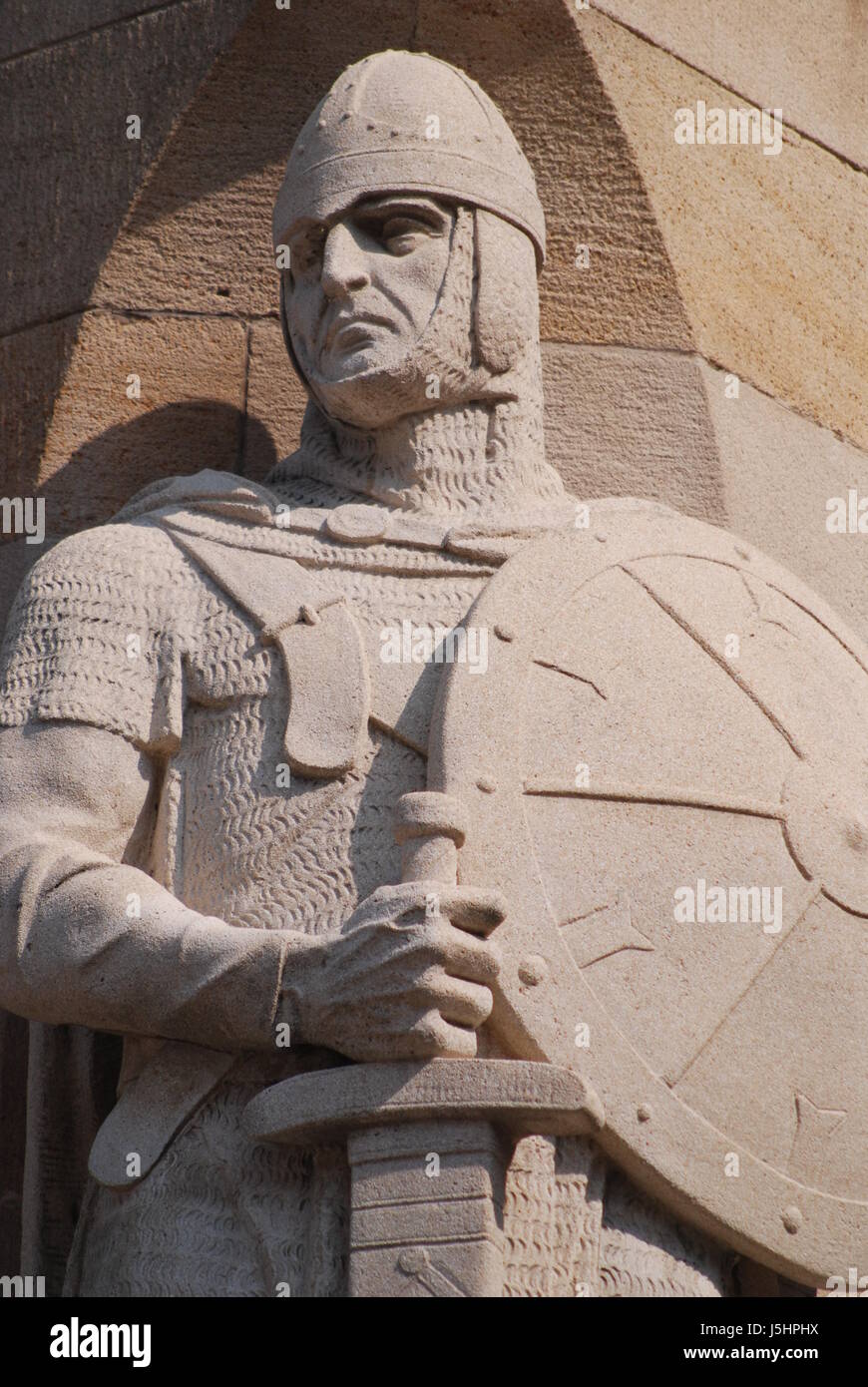 monument art work of art stone knight sword arm weapon fighter portrait ...