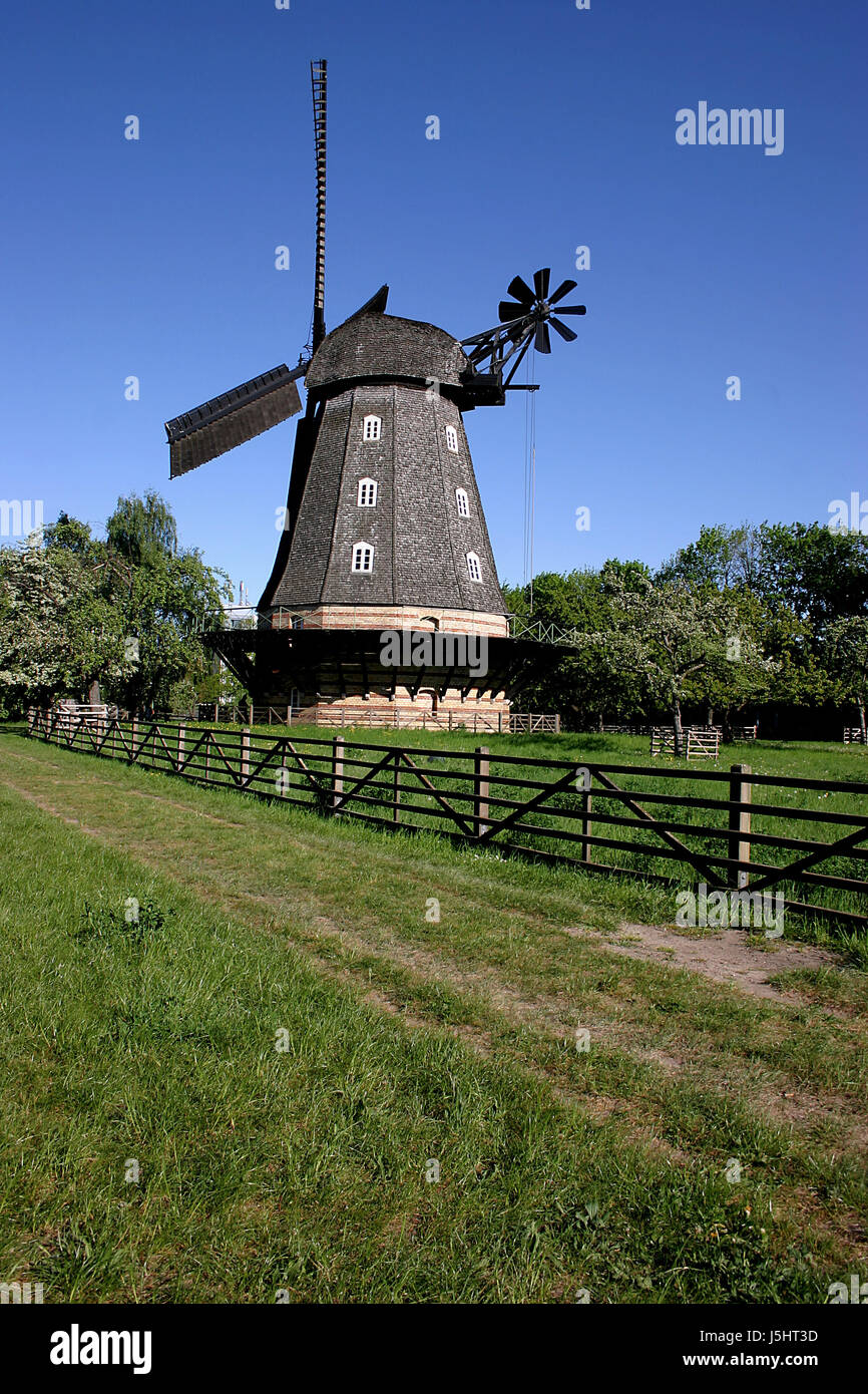 blue monument garden green wing spring berlin windmill mill portrait ...