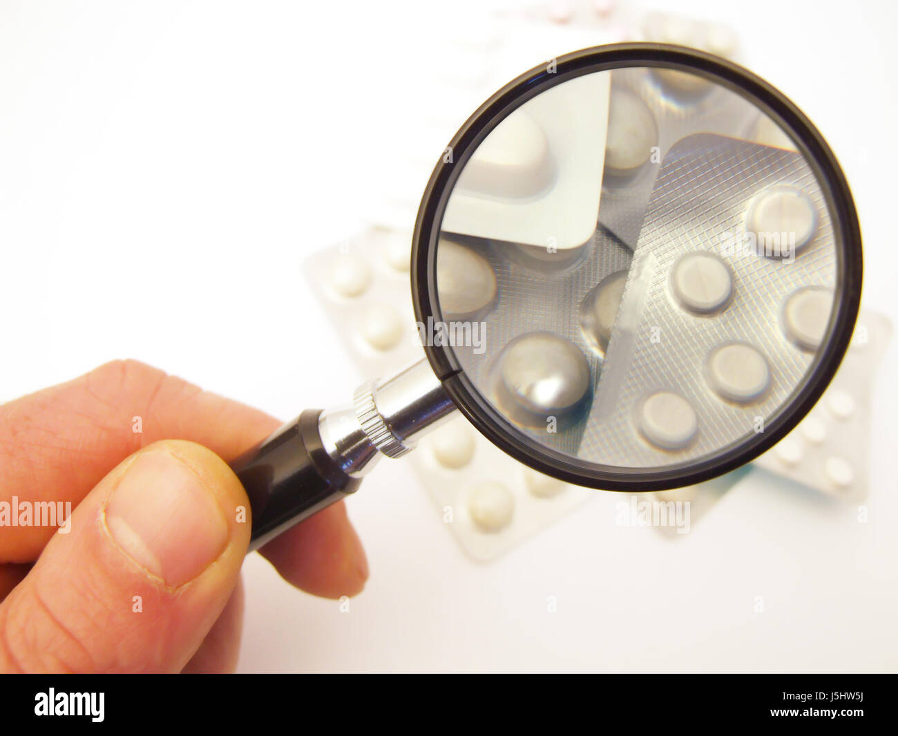 drugs under the microscope Stock Photo - Alamy