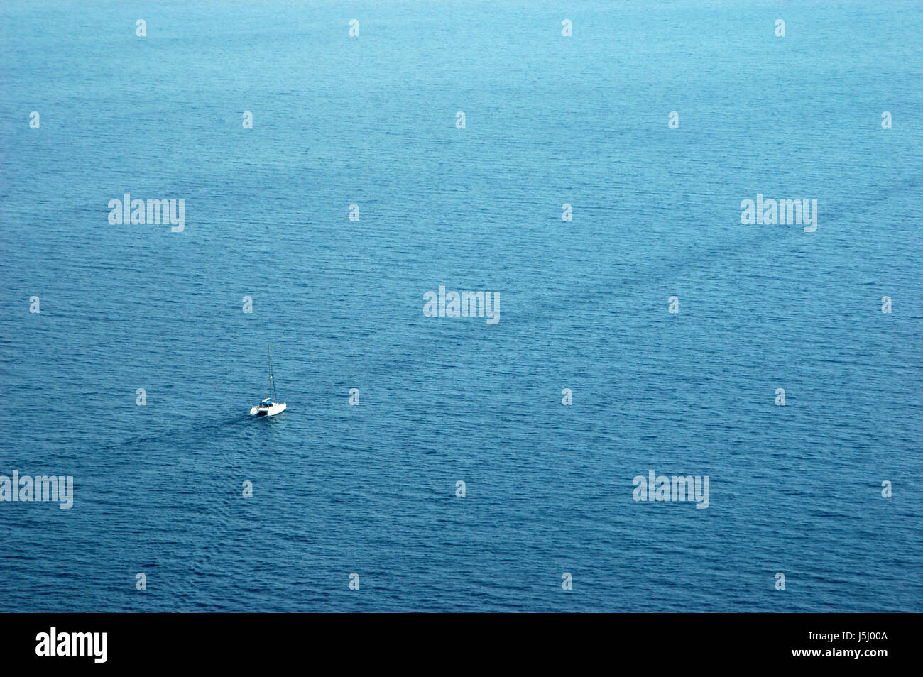 blue waves width sailing boat sailboat salt water sea ocean water ...