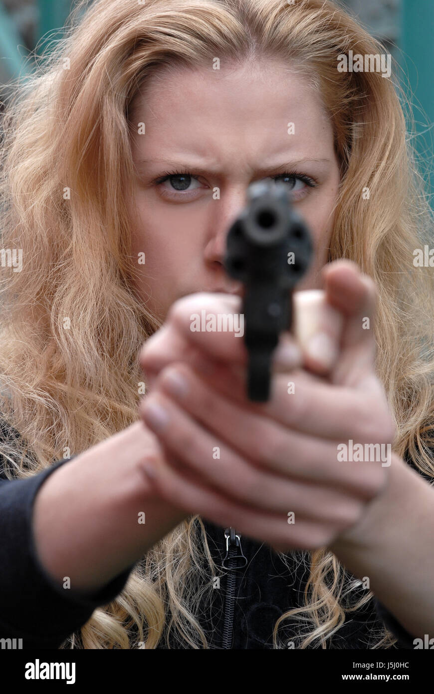 woman with gun Stock Photo - Alamy