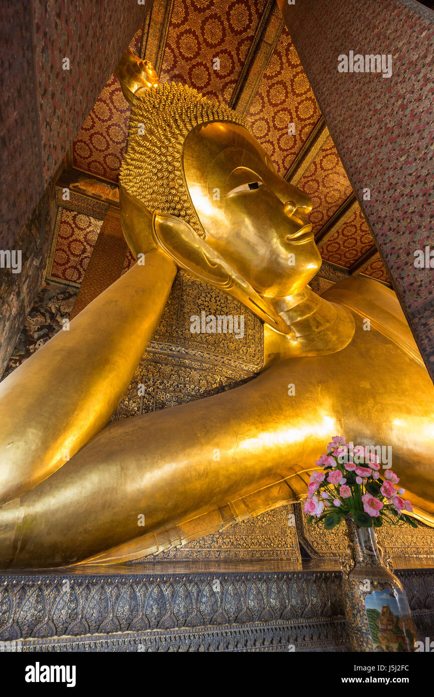 Torso of the famous Reclining Buddha statue at the Wat Pho (Po) temple ...