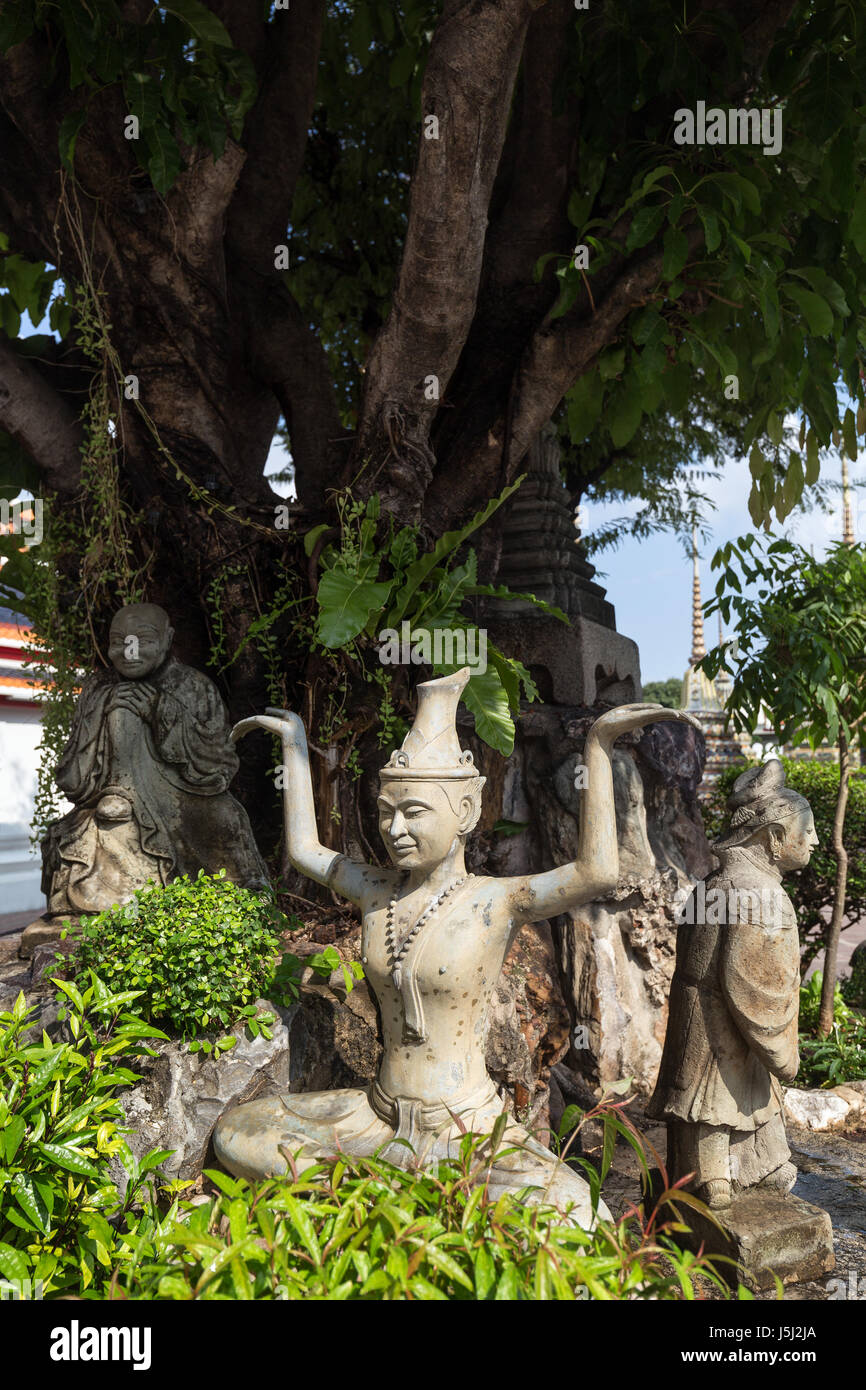 Three statues at the Wat Pho (Po) temple complex in Bangkok, Thailand ...