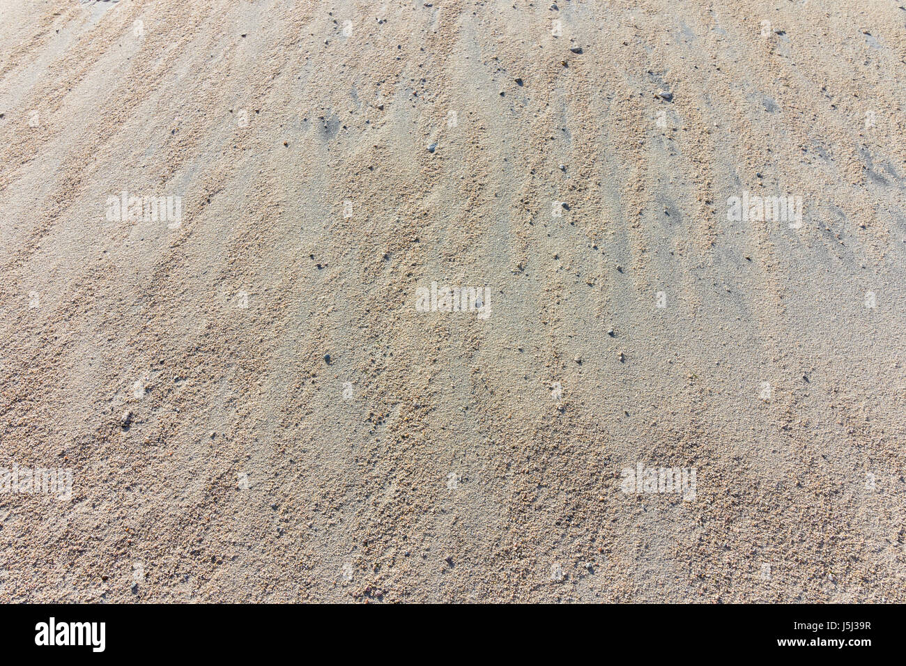 Sand on a steep hill background pattern Stock Photo - Alamy