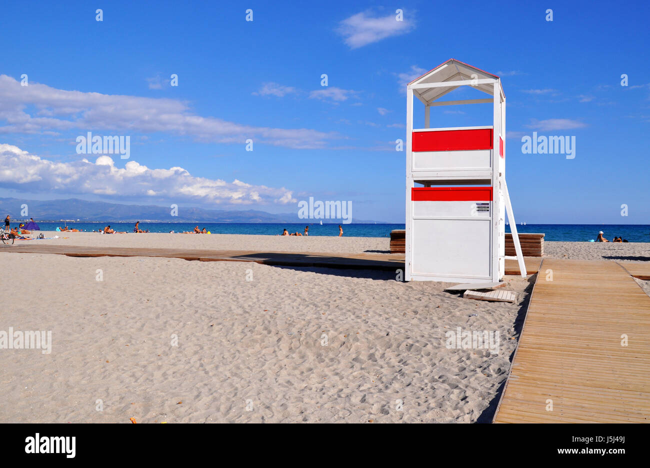 Cagliary beach view with red and white safeguard tower - mediterranean ...