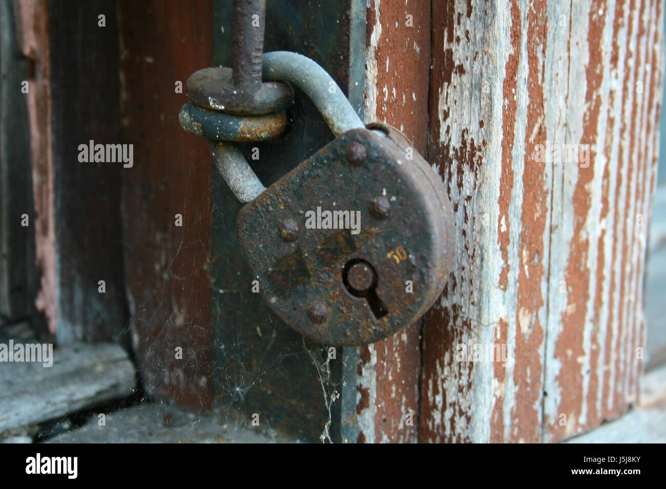 wood dust iron closed dusty spider webs keyhole fusty lock old schlo ...