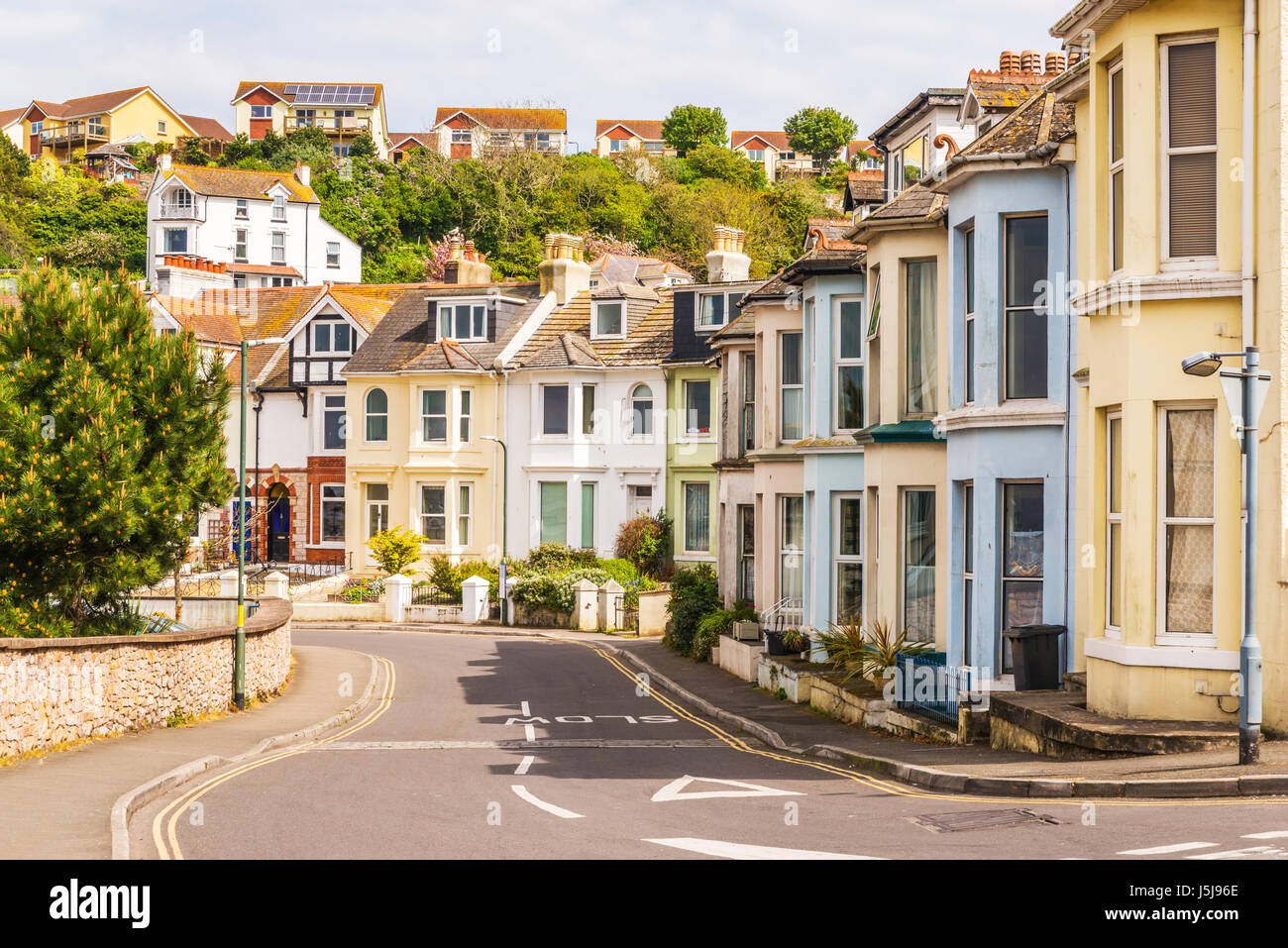 Typical English architecture, residential buildings in a row along the ...