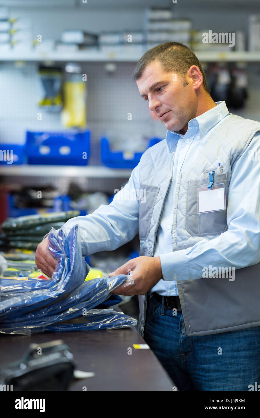 Man sorting stock Stock Photo - Alamy