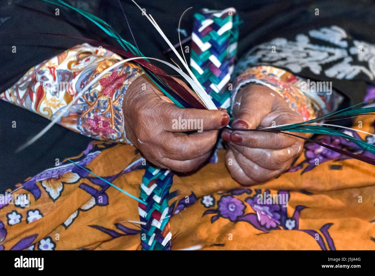 Hands of an arabic artisan woman weaving with lengths of reed Stock ...