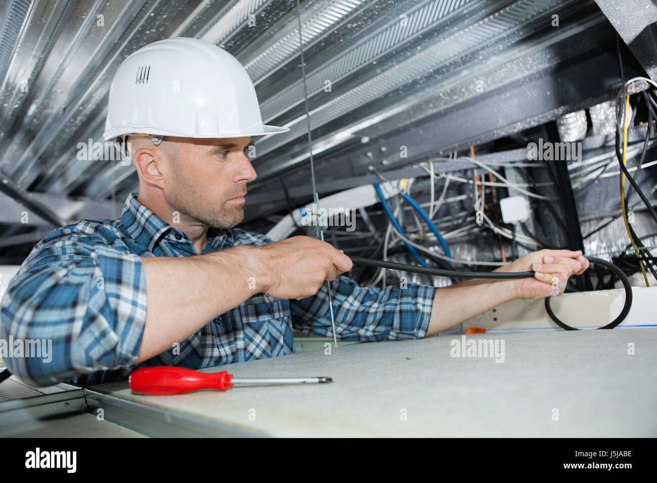 electrician at work Stock Photo - Alamy