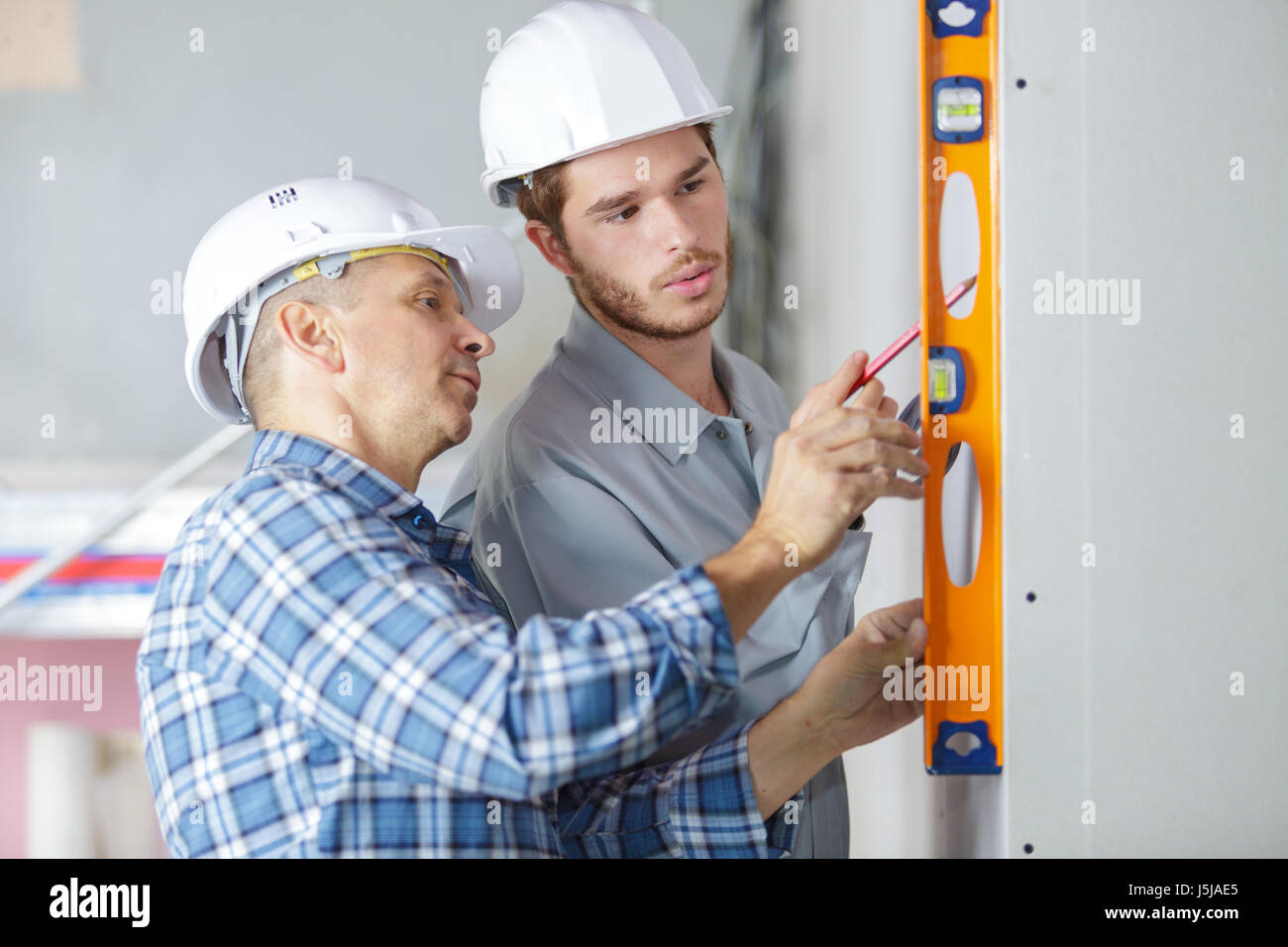 builders at work Stock Photo - Alamy