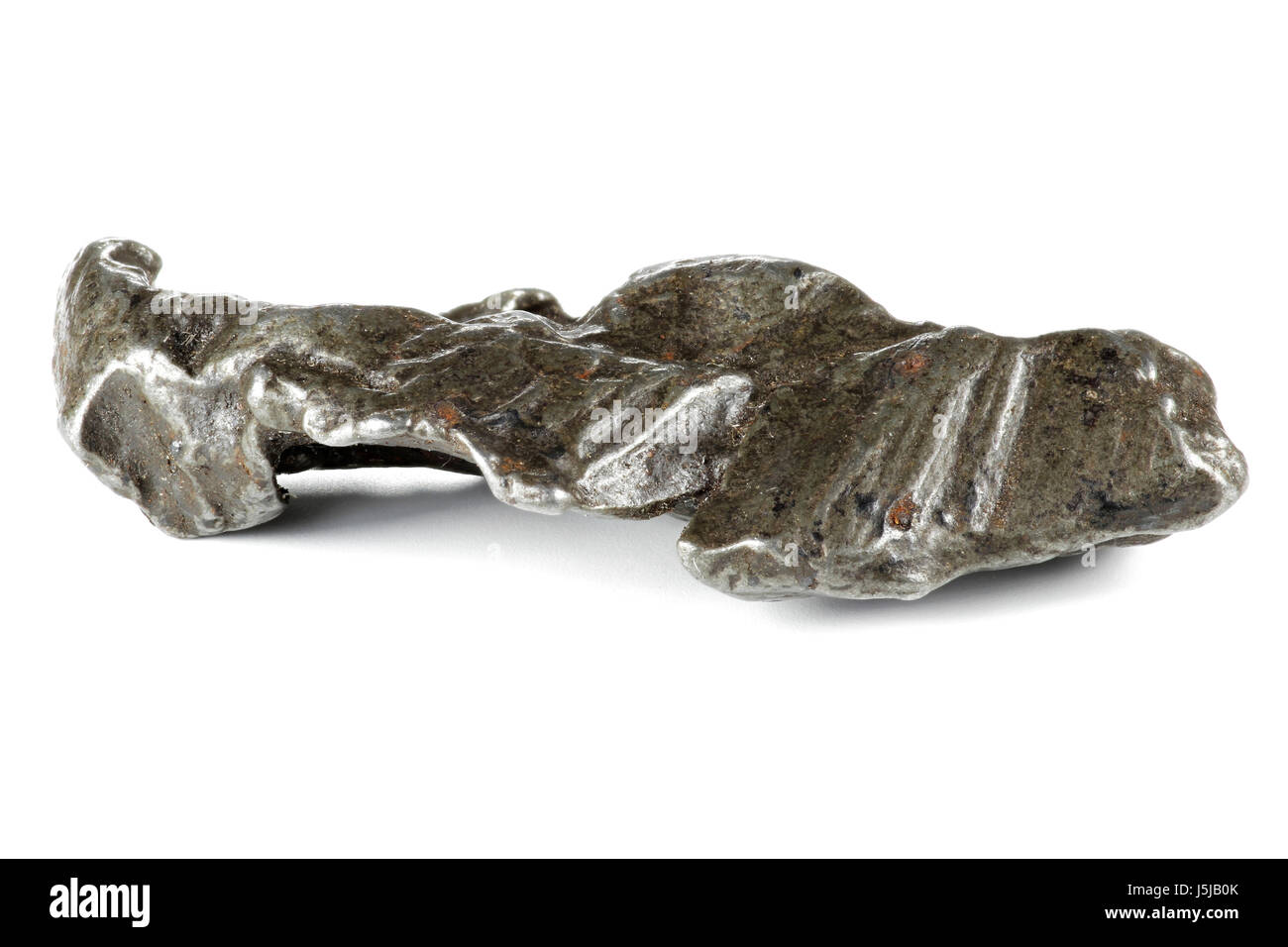 fragment of the Sikhote-Alin meteorite isolated on white background ...