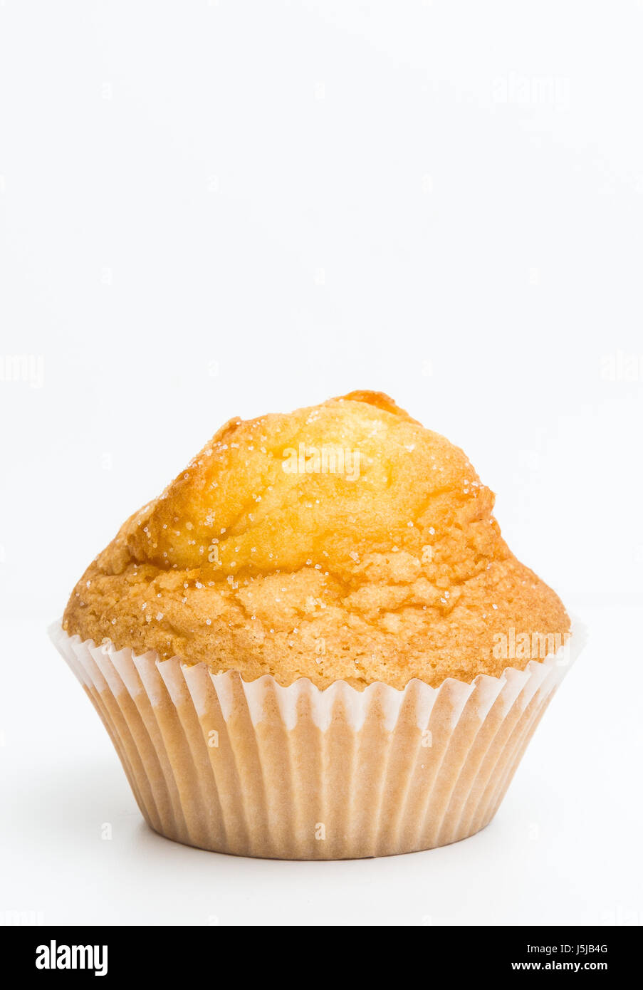 One muffin or magdalena isolated on white background Stock Photo - Alamy