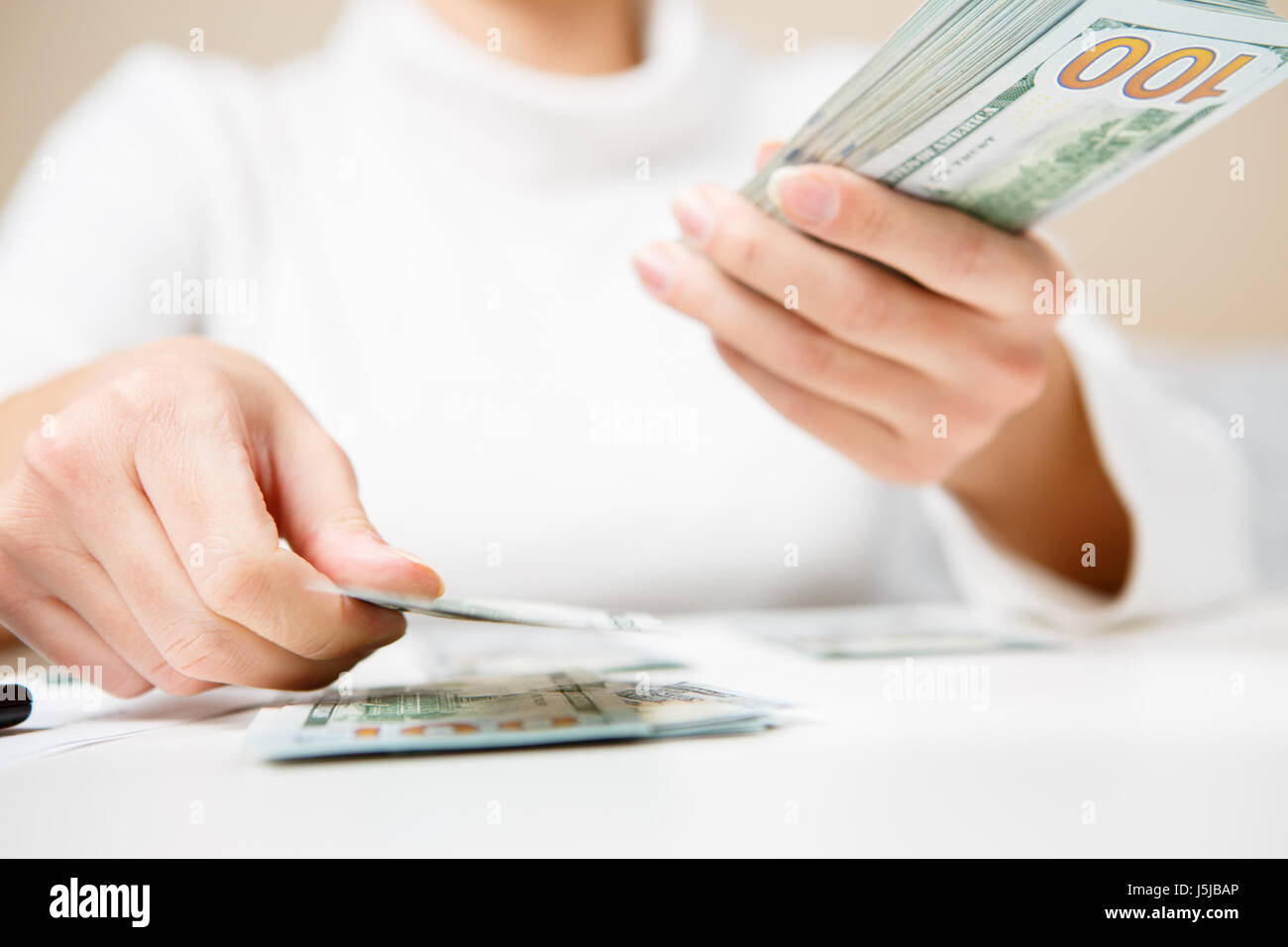 Hands counting money, close up Stock Photo - Alamy