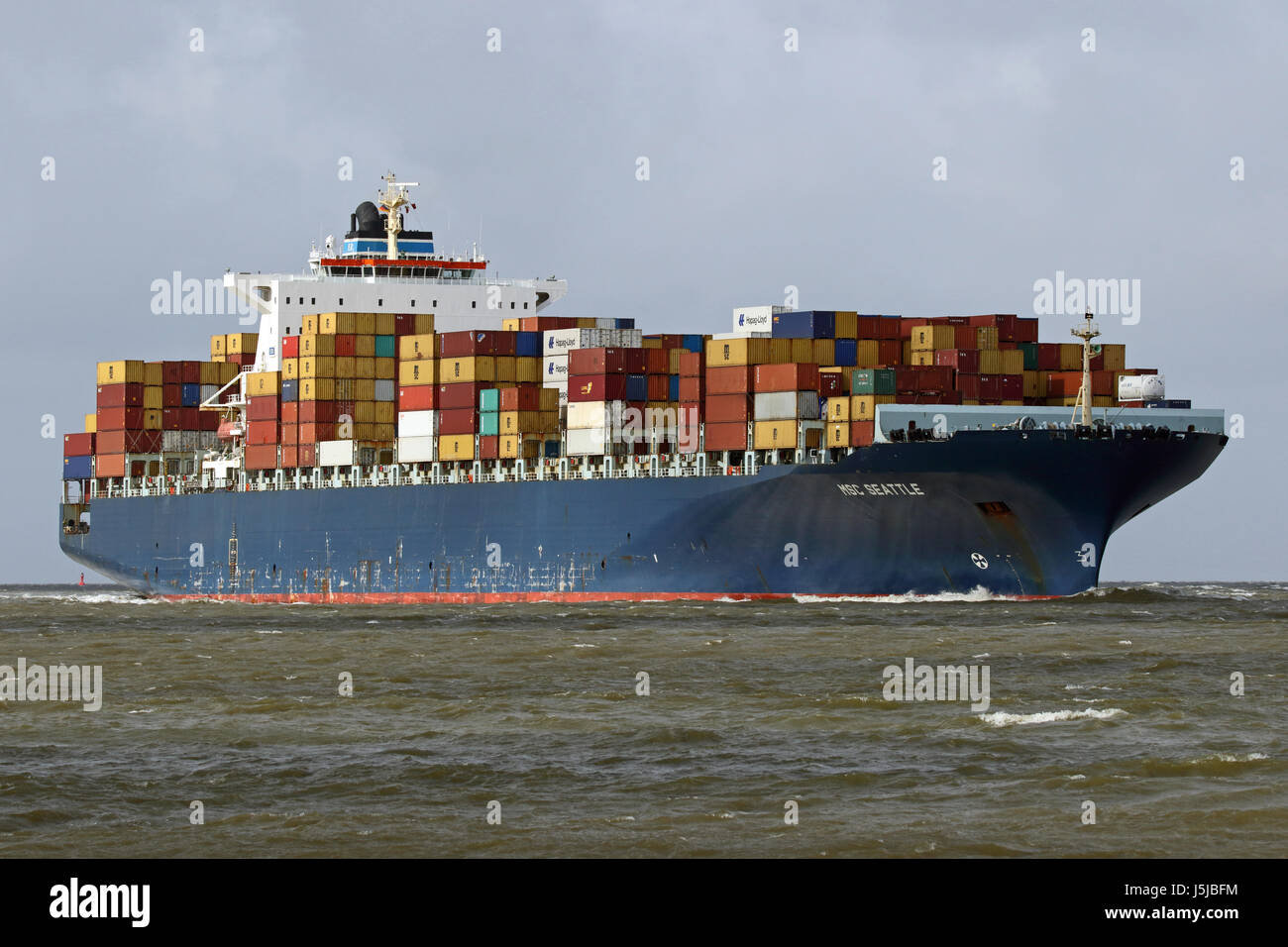 The container ship MSC Seattle passes the port of Cuxhaven on the Elbe ...