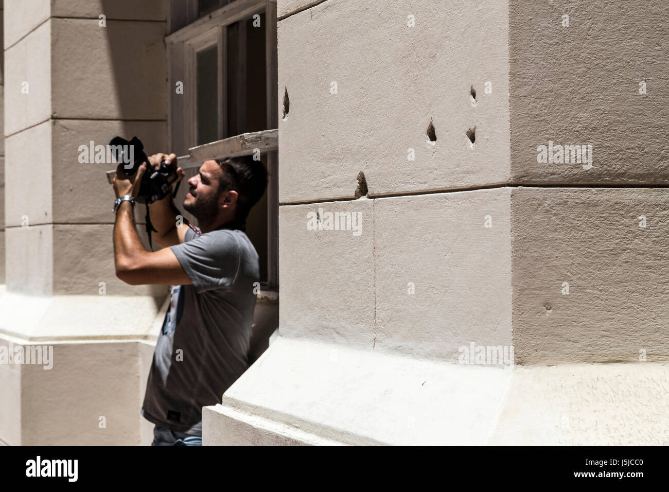 Bullet holes in the wall of the Museum of the revolution, Havana, Cuba ...
