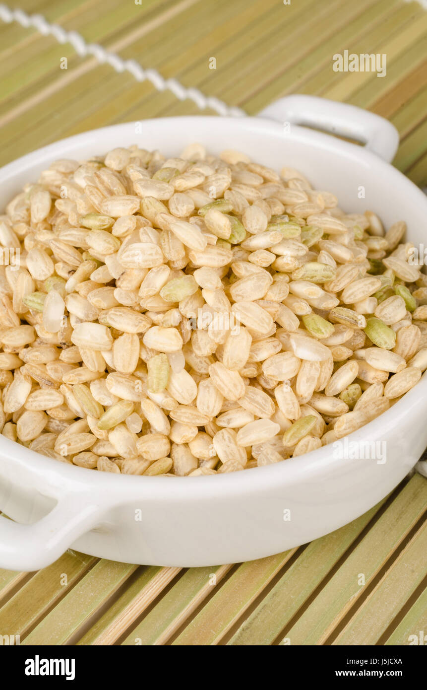 Whole and long grain white rice Stock Photo - Alamy