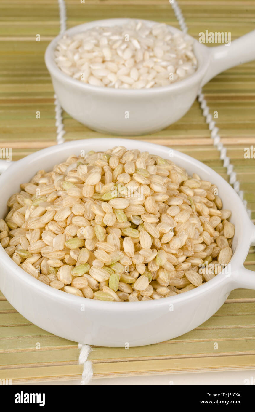 Whole and long grain white rice Stock Photo - Alamy