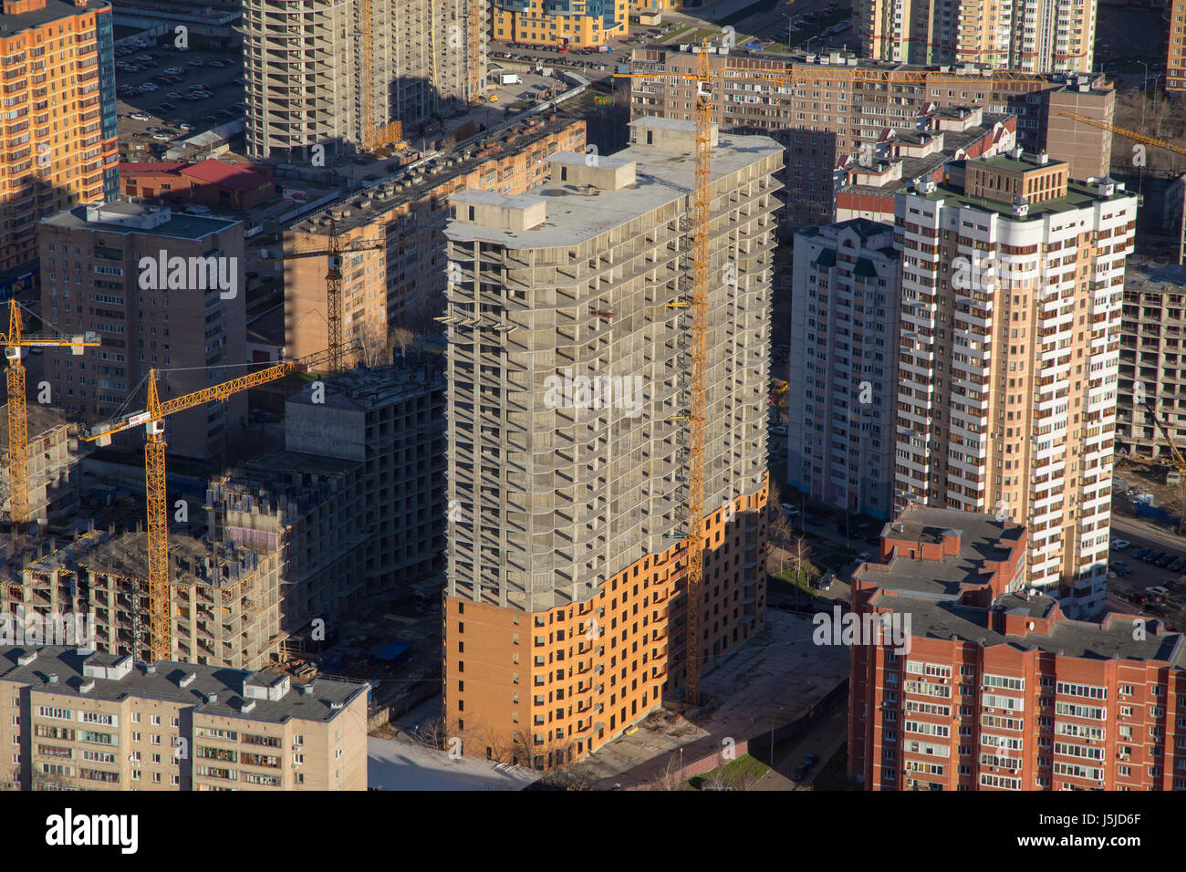 Construction site with cranes and building in Moscow region, Russia ...