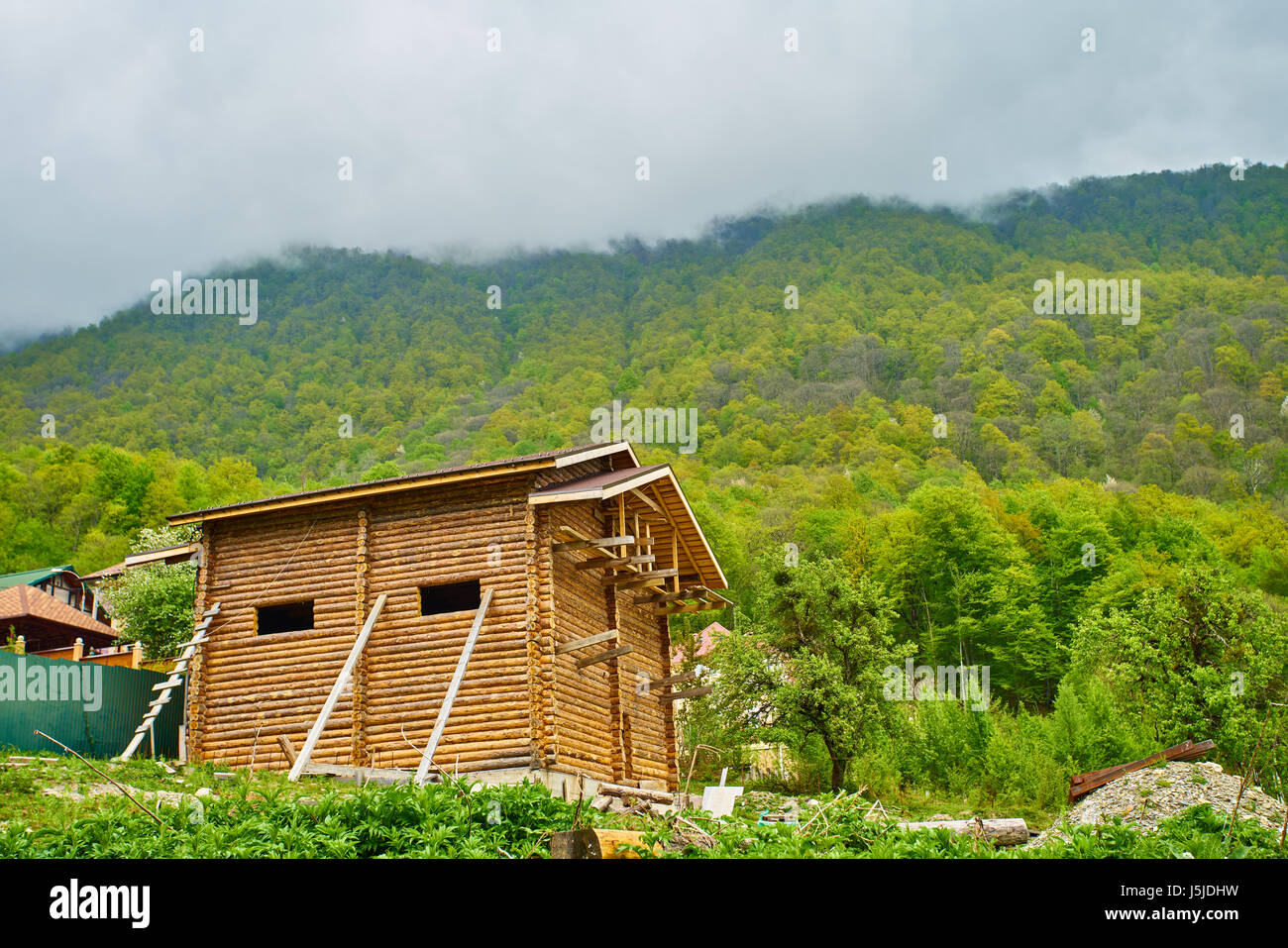 Construction of a new wooden house Stock Photo - Alamy