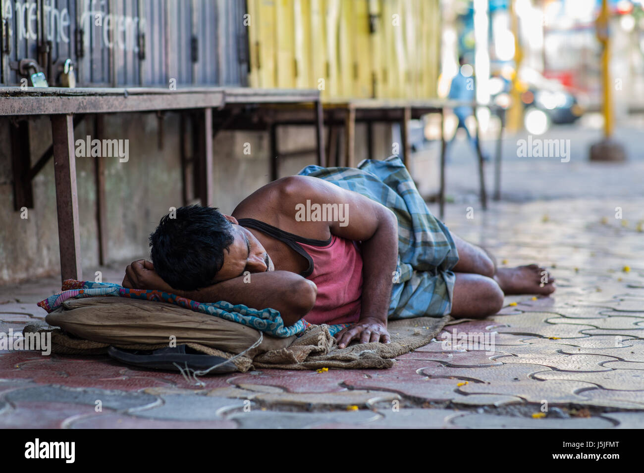 Man poverty sleeping street hi-res stock photography and images - Alamy
