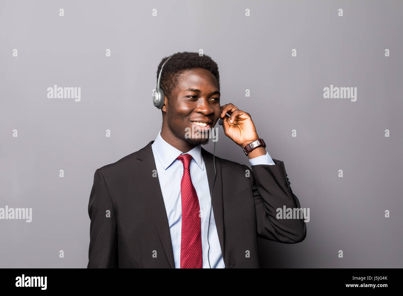 Closeup portrait of a young male customer service representative or ...