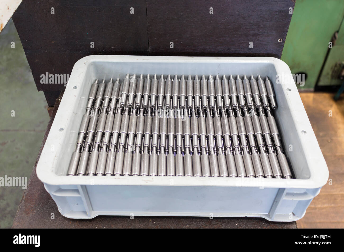 Stack of automotive machined steel parts keeping in plastic box Stock ...