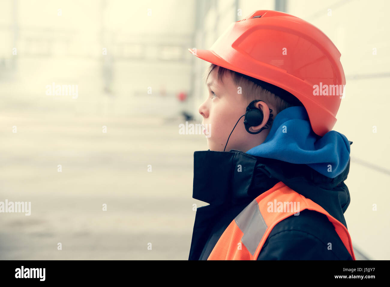 Boy with safety helmet hi-res stock photography and images - Alamy