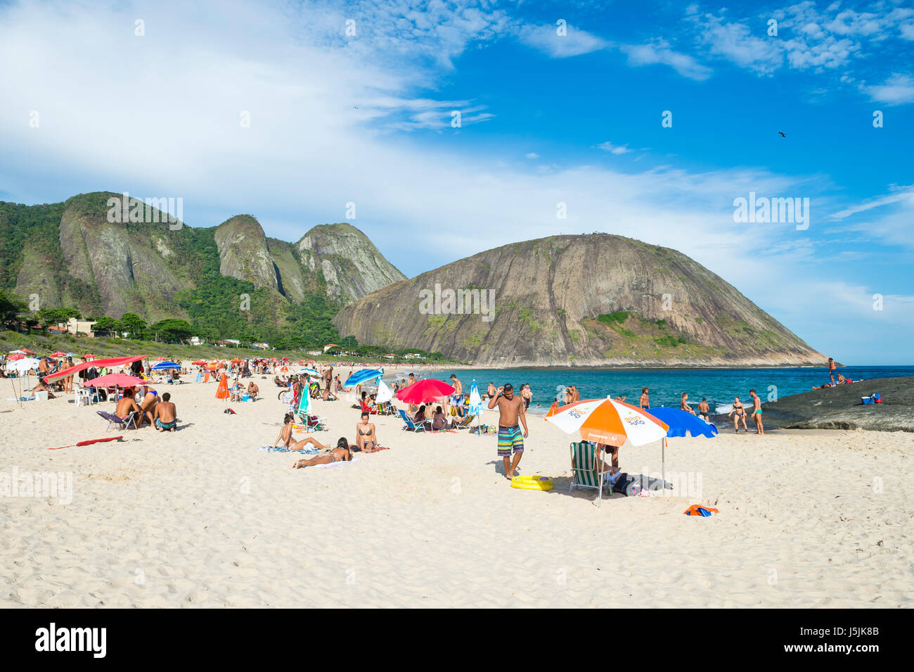 RIO DE JANEIRO - MARCH 4, 2017: Beachgoers take advantage of a sunny ...