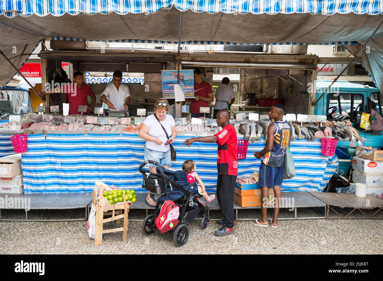RIO DE JANEIRO - JANUARY 31, 2017: Customers shop at the fish market ...