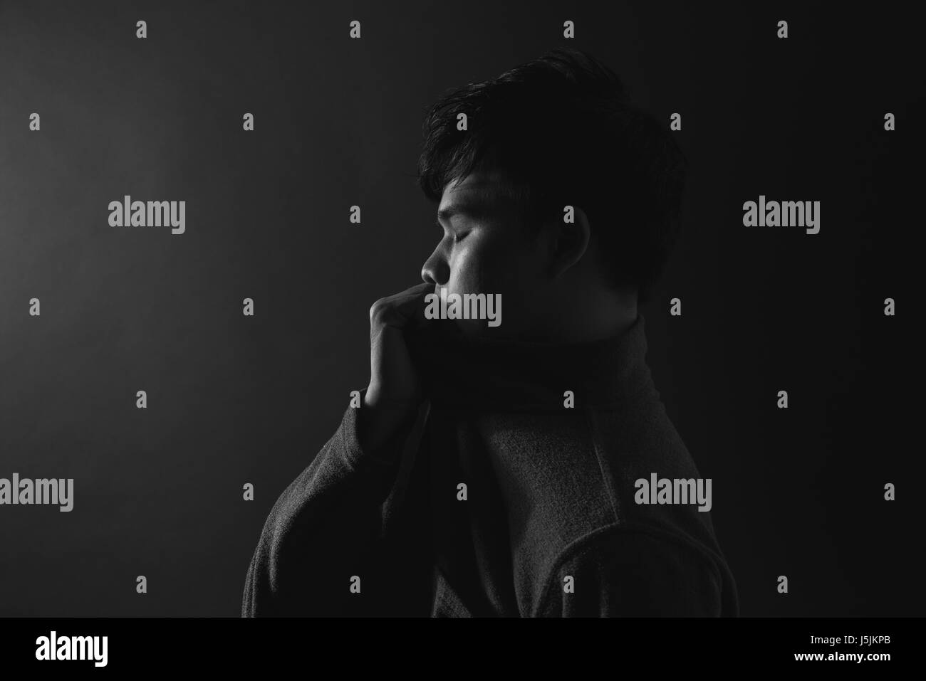 Portrait of sad young asian men. Sadness Stock Photo - Alamy