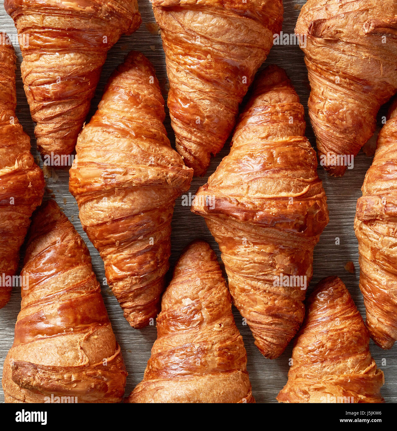 freshly baked croissants, top view Stock Photo - Alamy